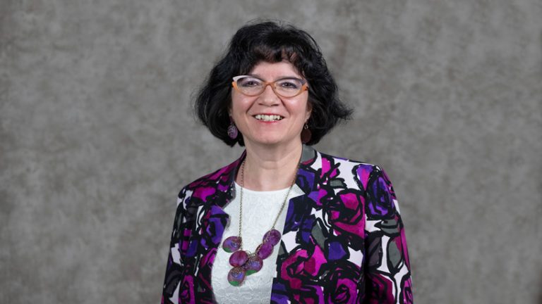Marie Mora receives American Society of Hispanic Economists’ 2022 ...